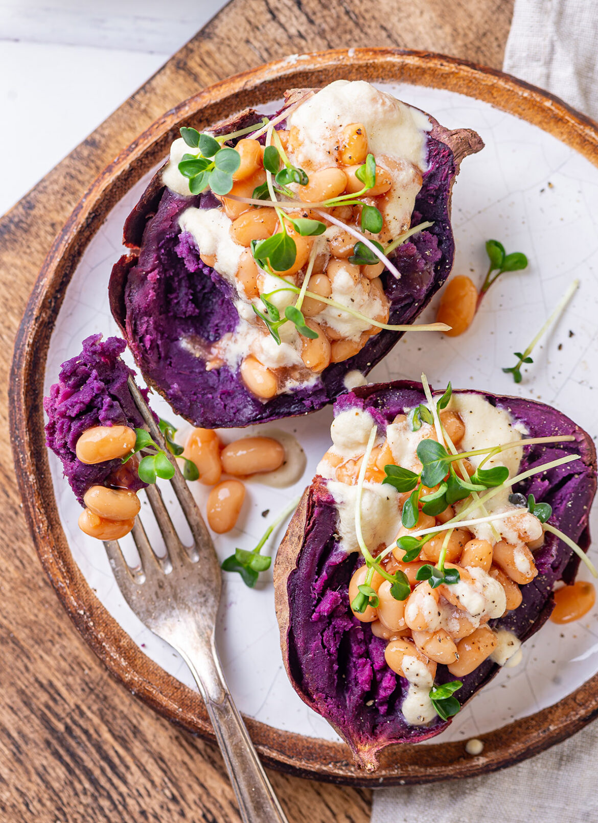 Baked Purple Sweet Potatoes with Beans and Cashew sauce