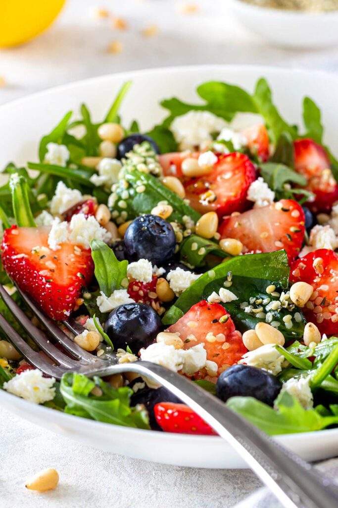 Mixed Green Salad with Strawberries, Blueberries, and Feta Cheese